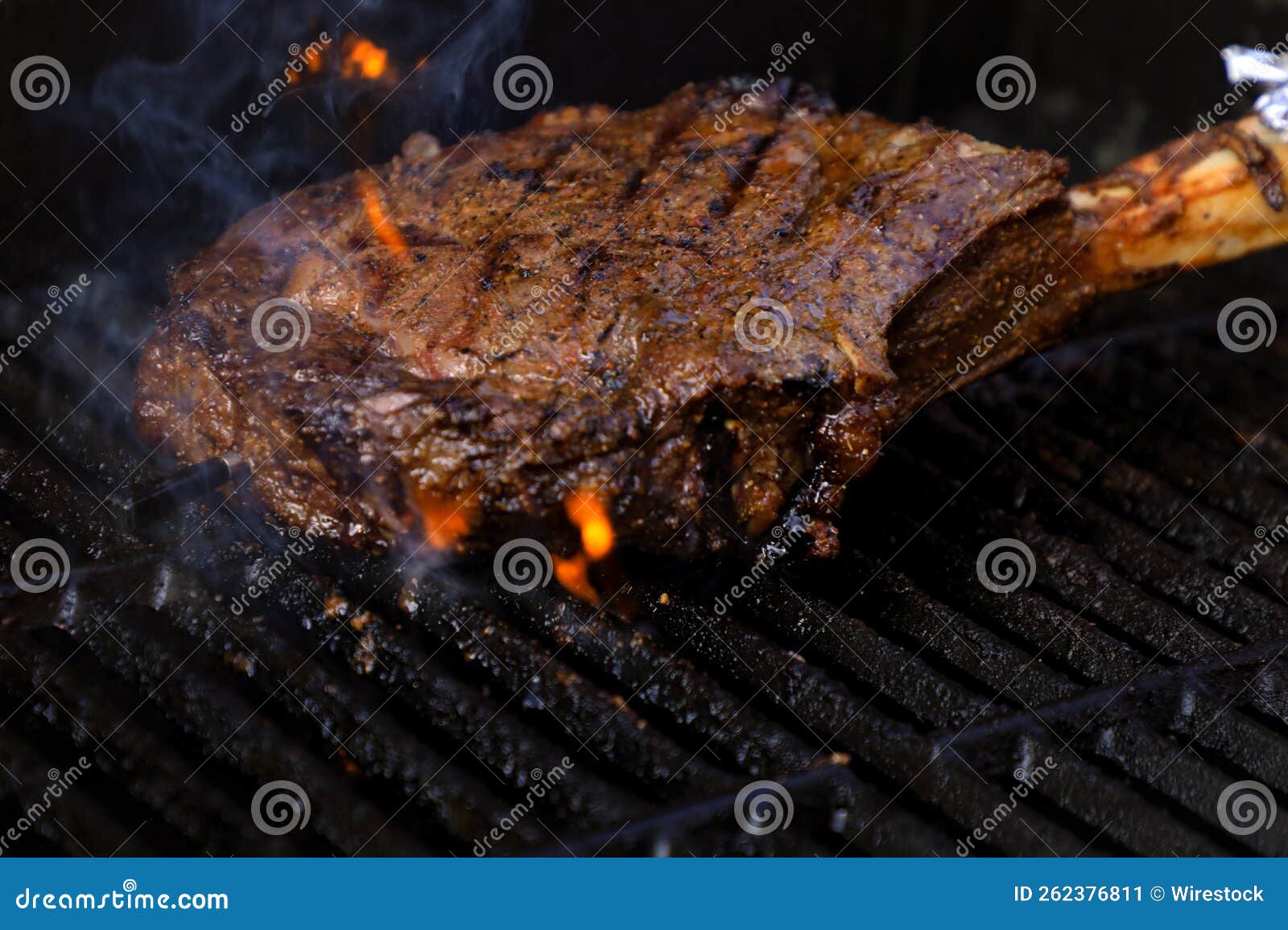 Tomahawk Steak on a Grill Grid on Fire Stock Image - Image of roast ...