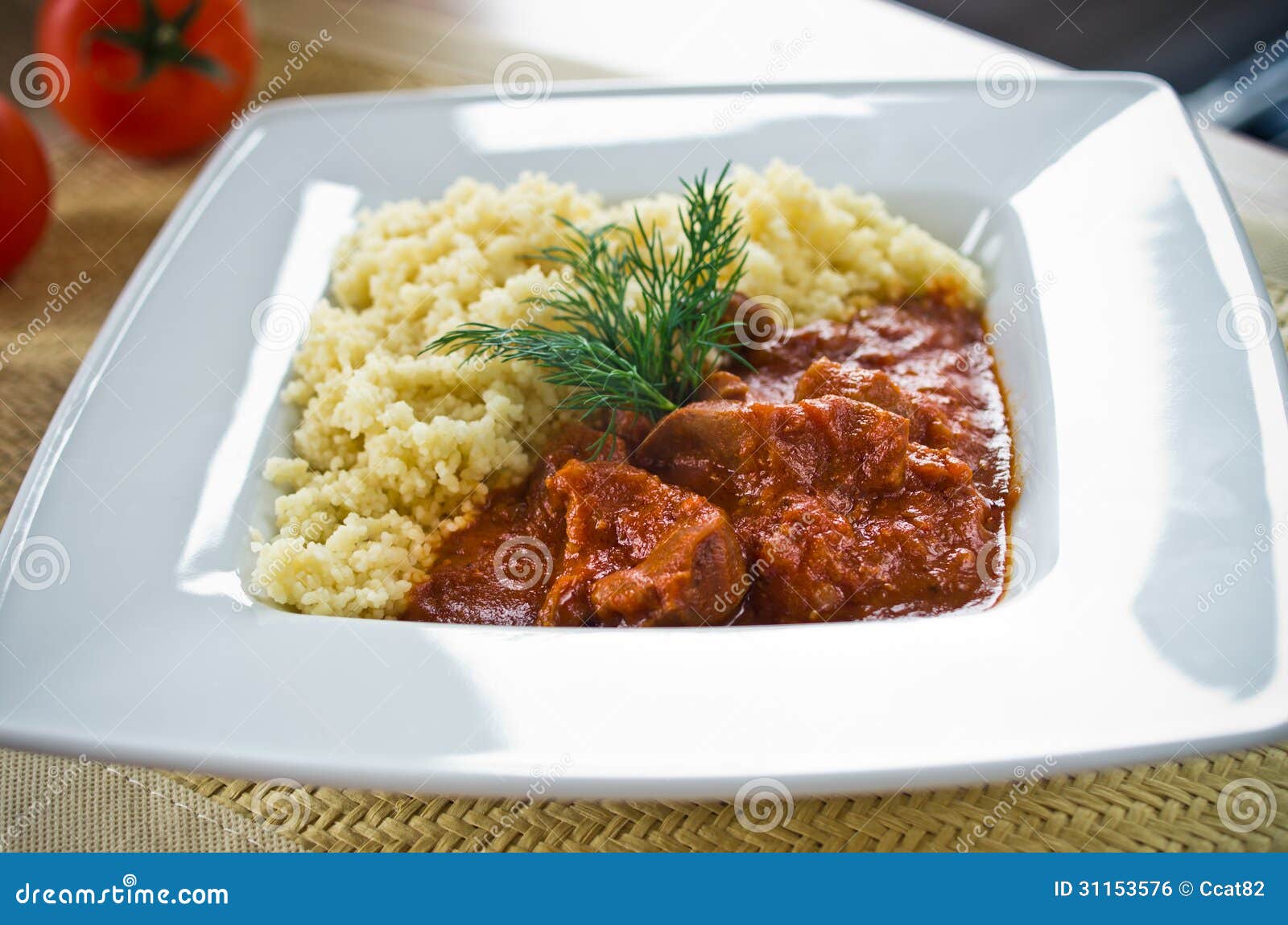 Tomato curry with couscous stock photo. Image of ethnic - 31153576
