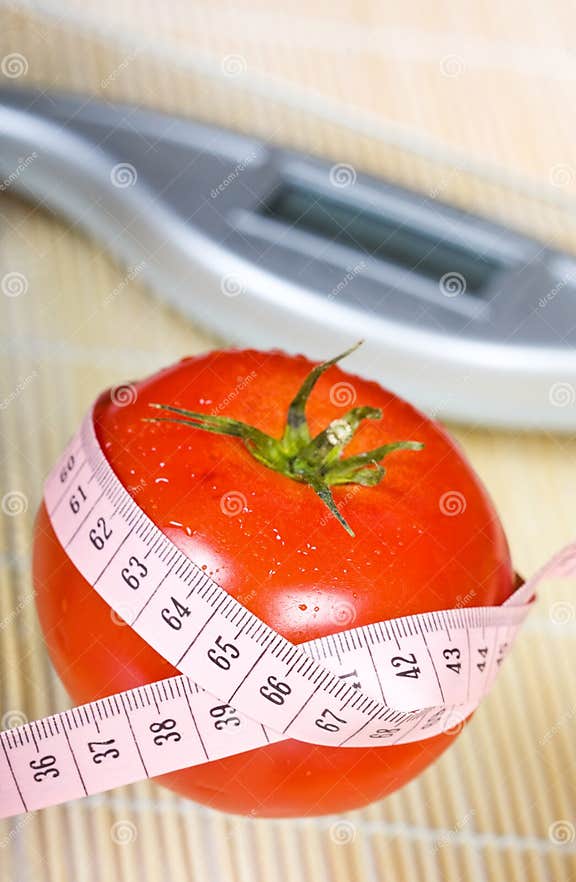 Tomato with measure stock photo. Image of measure, slim - 10973012