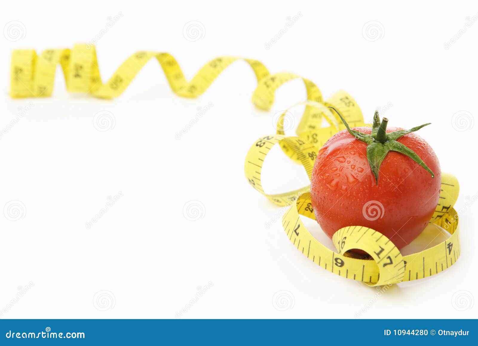 Tomato with measuring tape stock photo. Image of background - 10944280