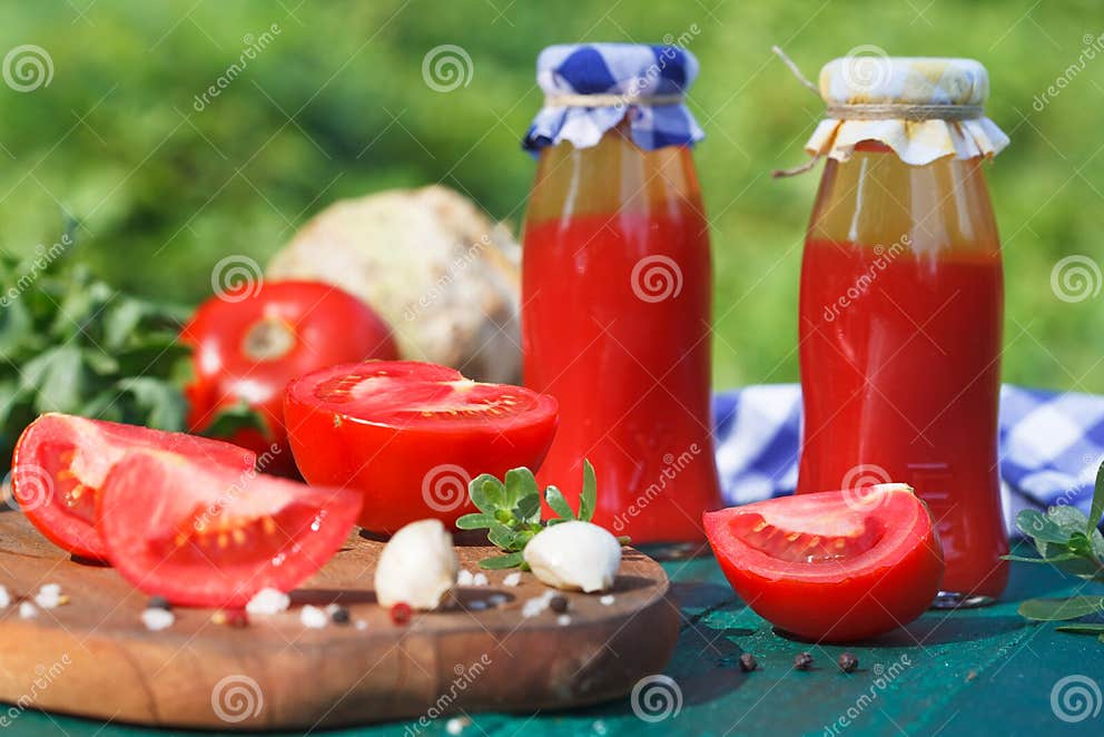 Tomato Paste, Puree in Small Bottles and Fresh Tomatos Stock Image ...