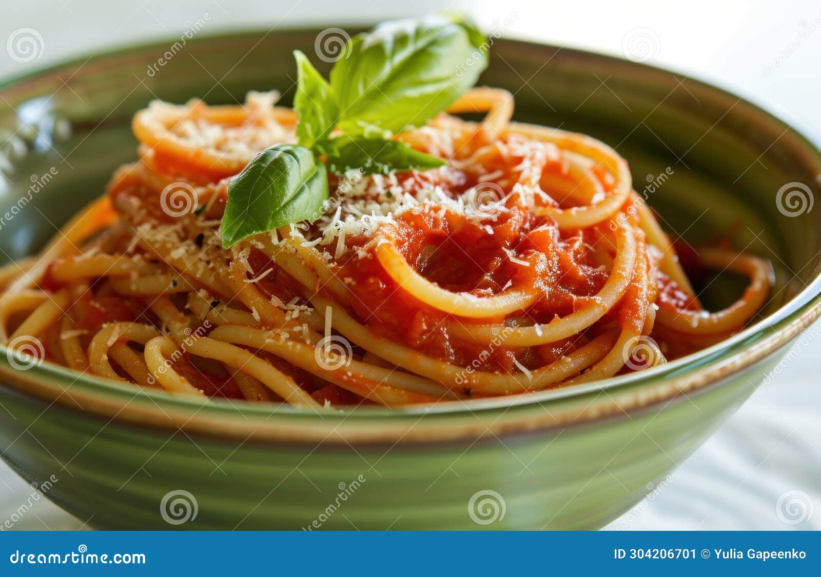 Tomato Paste on Spaghetti in Green Ceramic Bowl in White Stock Image ...