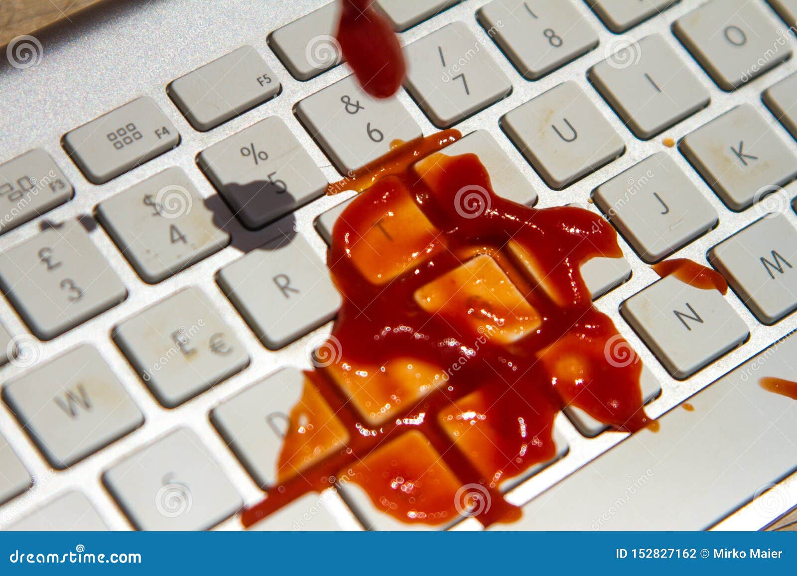 Tomato Puree Falling on the Computer Keyboard Stock Photo - Image of ...