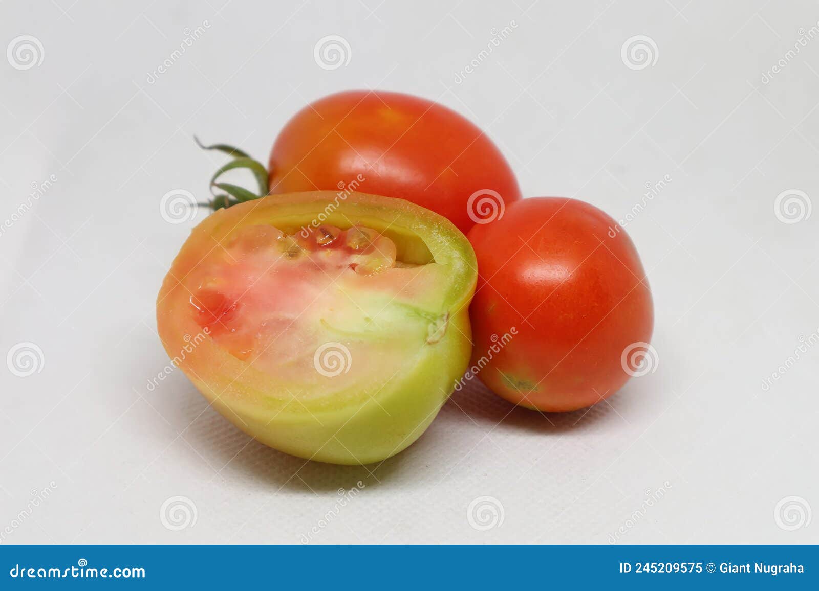 2 Tomato with 1 Slice in Front Stock Image - Image of tomato, cuisine ...