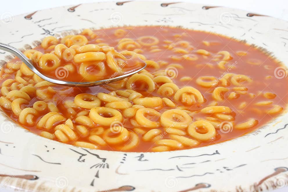 Tomato soup and pasta ring stock photo. Image of inexpensive - 13360632