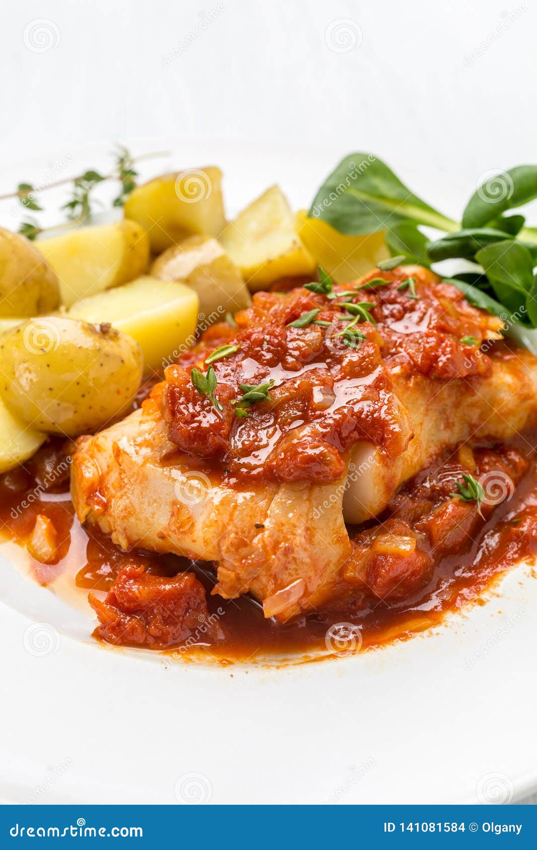 Cod or Pollack Cooked in Tomato and Thyme Sauce Stock Photo - Image of ...