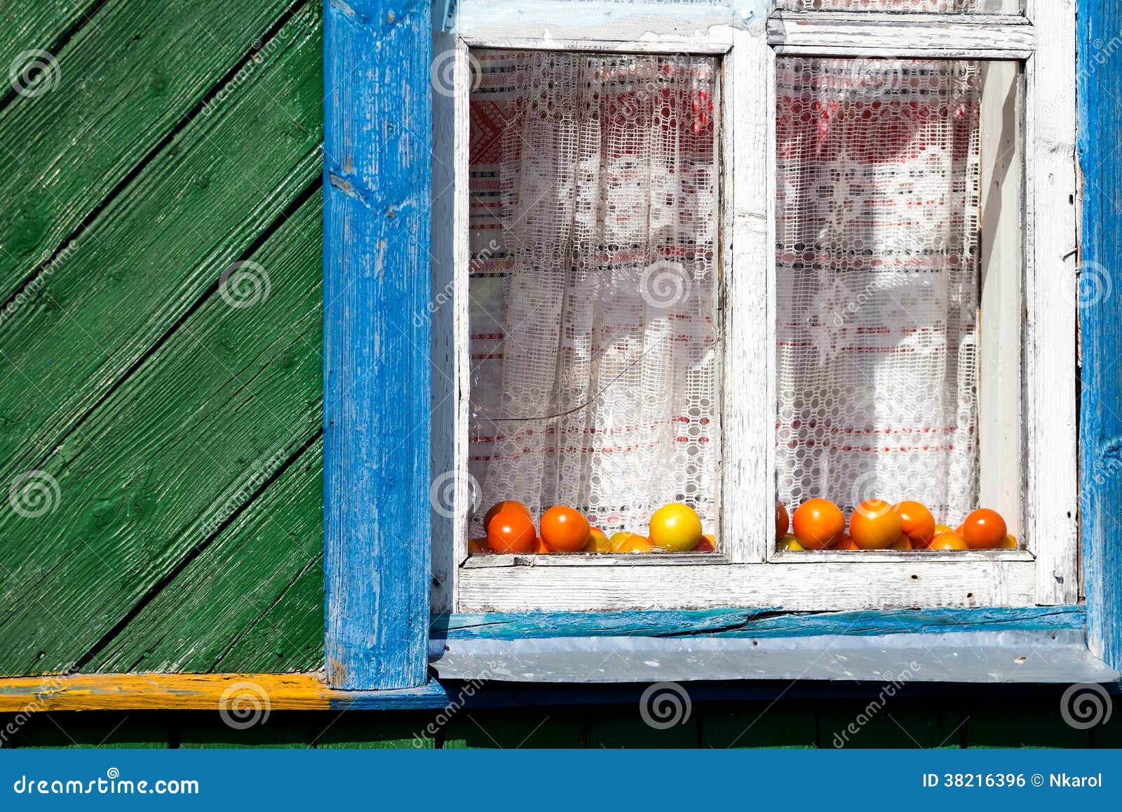 An Old Window In The Village. Colored Glass In The Window Frame. Facade ...