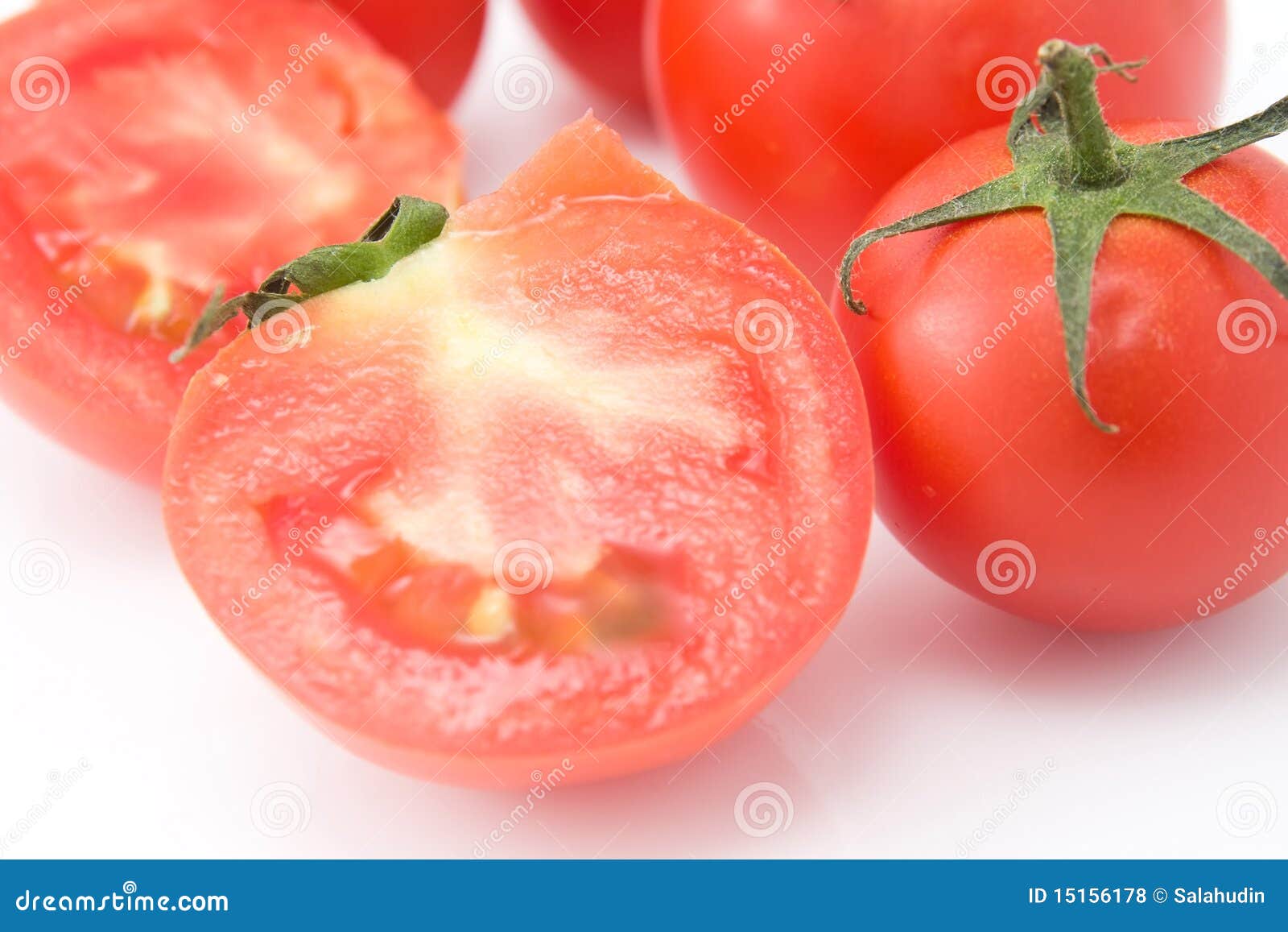 Tomatoes cut stock photo. Image of heap, isolated, piece - 15156178