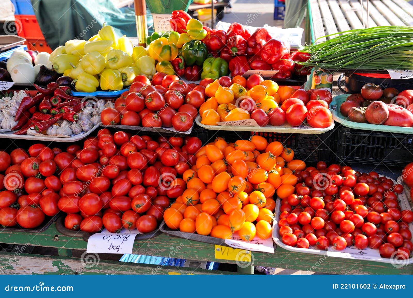 Tomatoes on a farm market stock photo. Image of yellow - 22101602