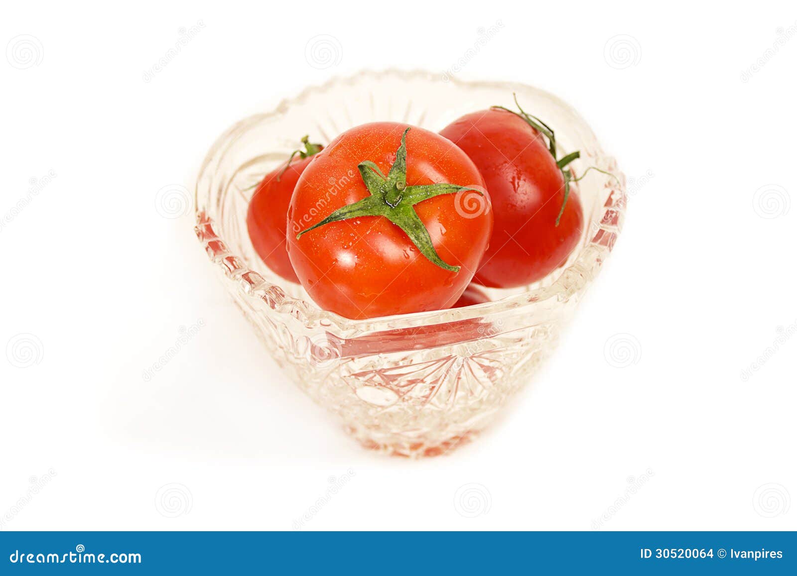 Tomatoes in a glass vase stock photo. Image of vegetarian - 30520064