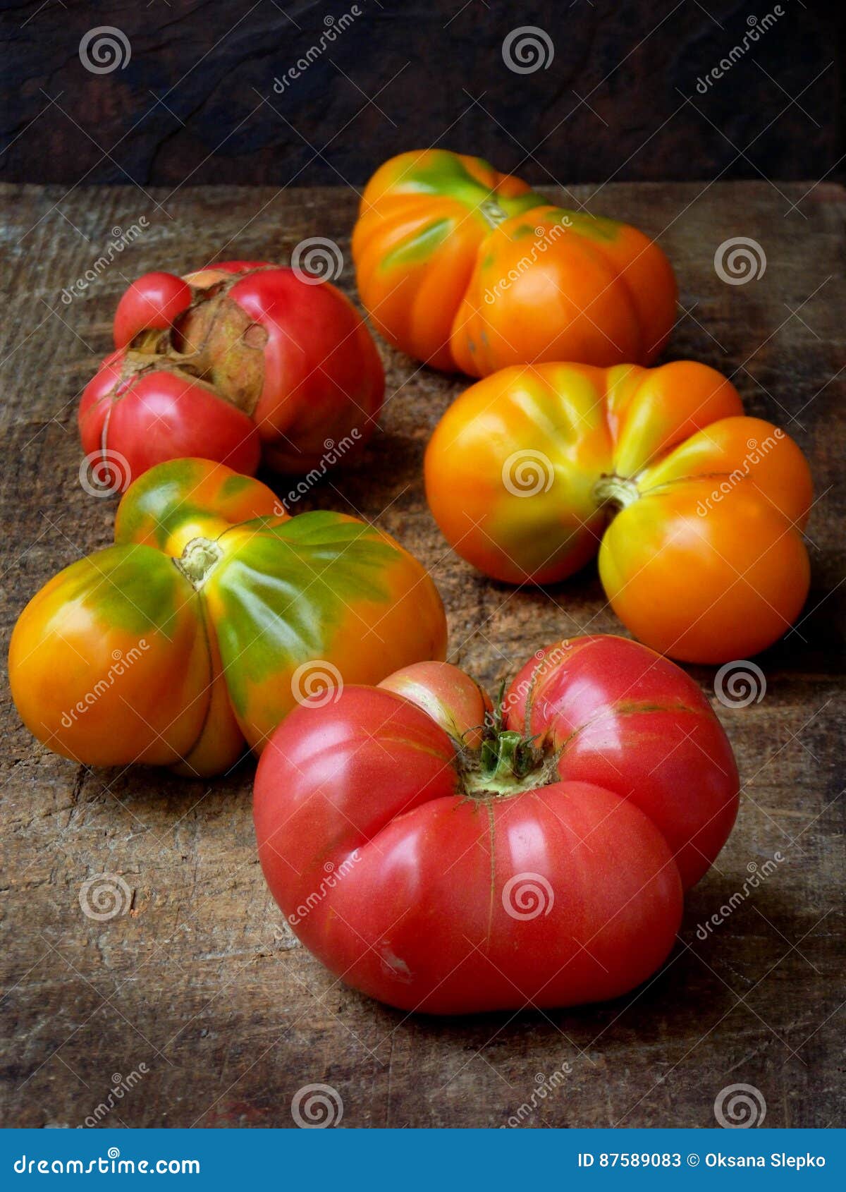 Tomatoes Irregular Shape of Different Varieties and Colors on Wooden ...