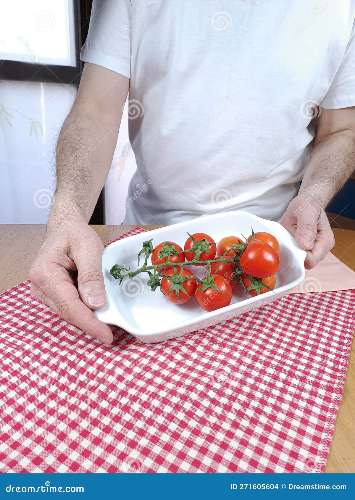 Tomatoes Isolated in the Plate Man Rests on the Table Stock Photo ...