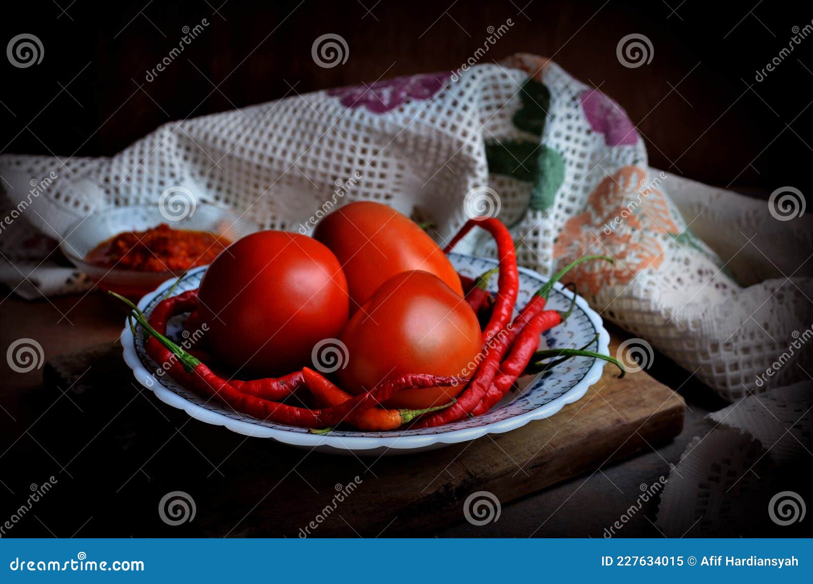 Tomatoes and Red Chilli on a Chopping Board Stock Image - Image of ...