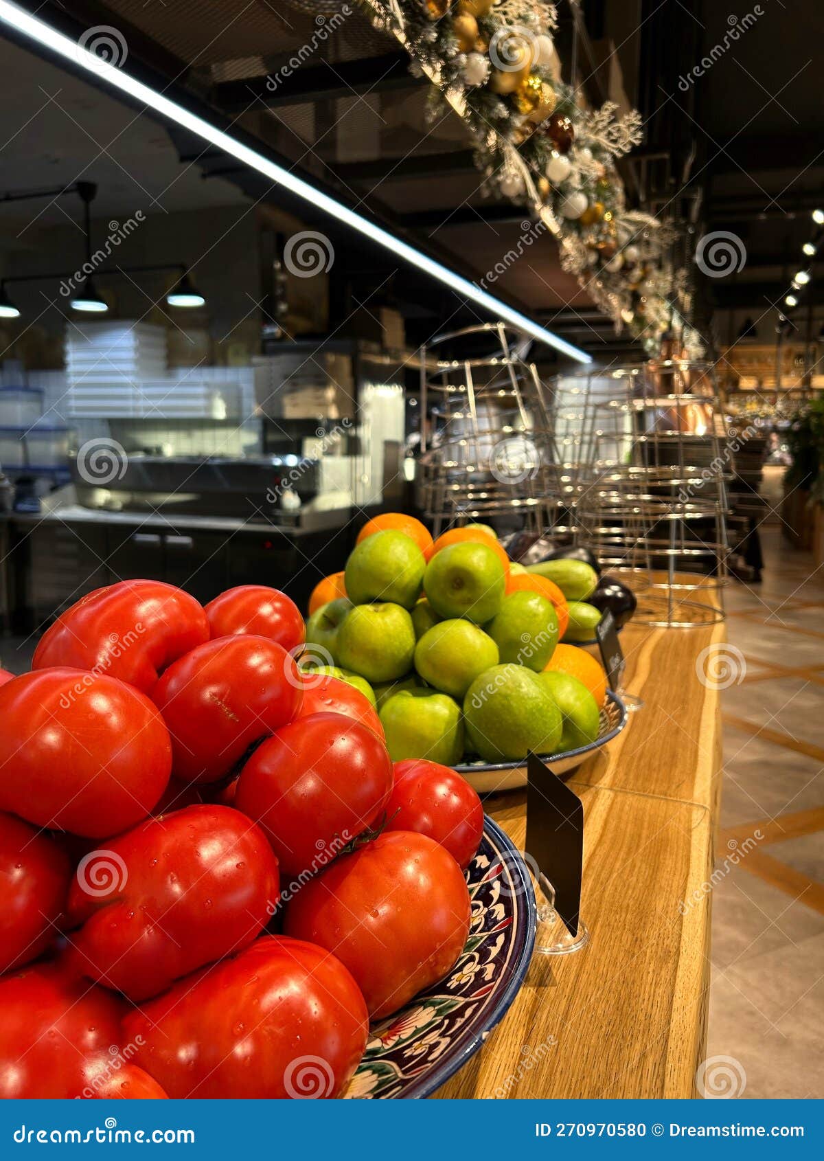 Tomatoes on a Shelf in a Restaurant in a Plate Stock Photo - Image of ...