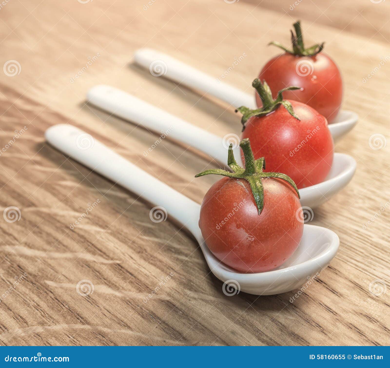 Tomatoes in Spoons stock image. Image of healthy, fresh - 58160655