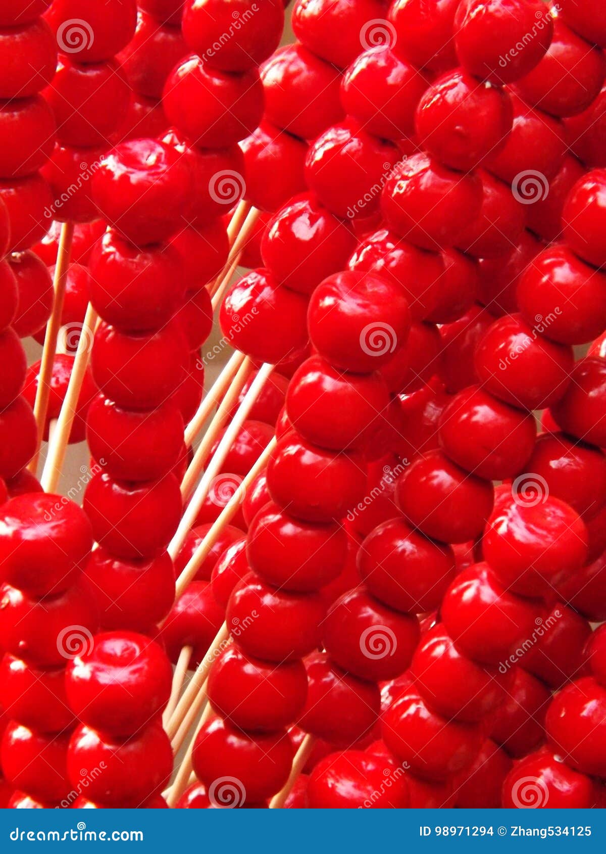 Tomatoes on sticks stock photo. Image of stick, hawthorn - 98971294