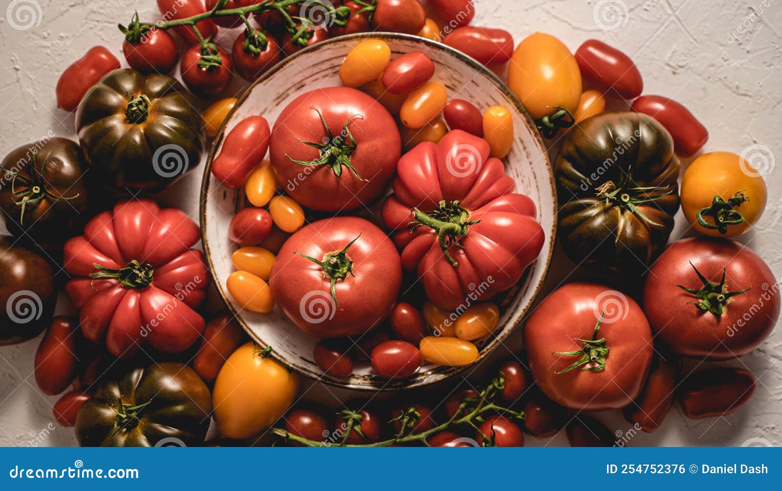 Tomatoes on the Table. Tomatoes of Different Varieties Stock Photo ...