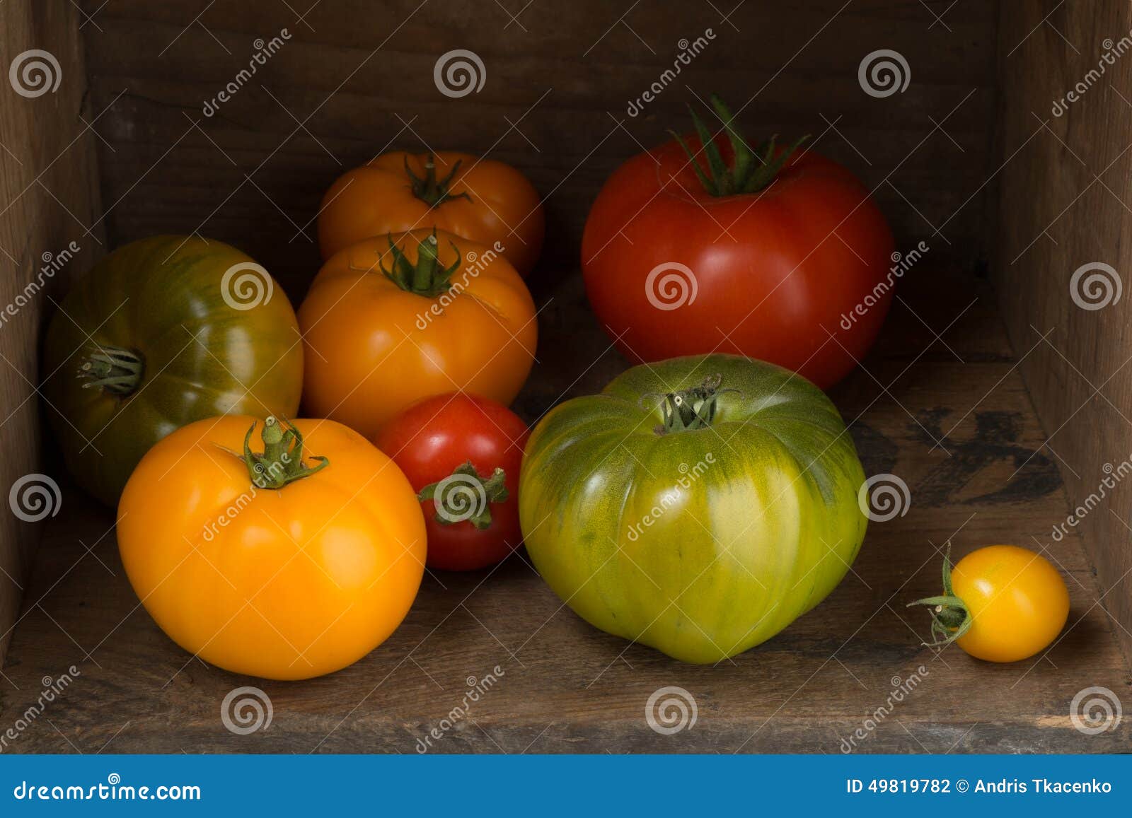 Tomatoes in a wooden box stock photo. Image of vegetarian - 49819782