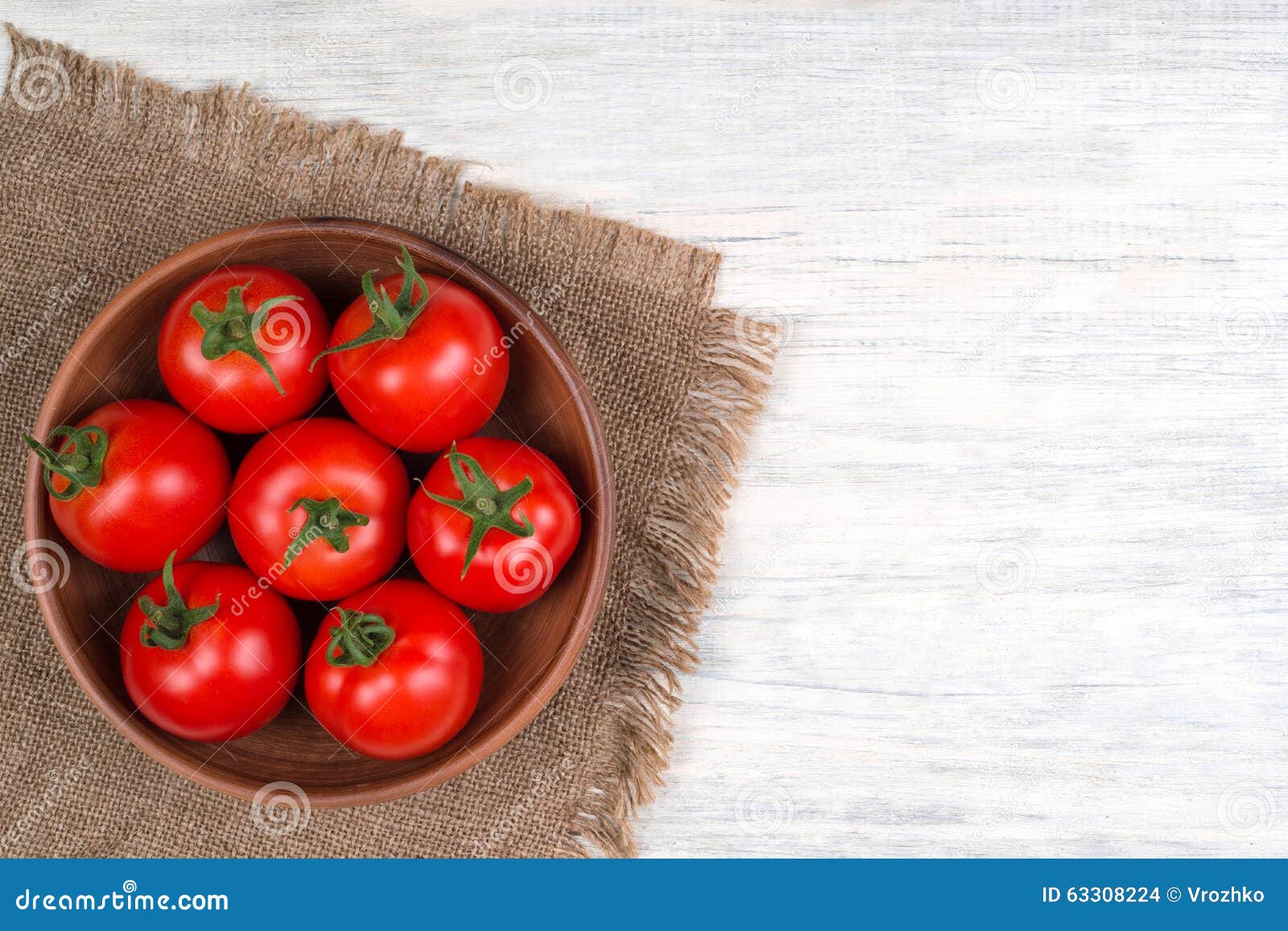 Tomatoes on Wooden Table in Bowl Top View Stock Photo - Image of ...