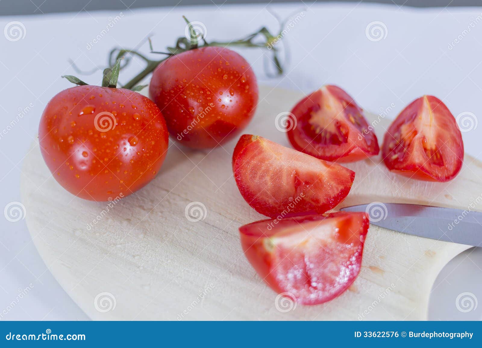 Tomatos stock photo. Image of knife, ecological, fresh - 33622576