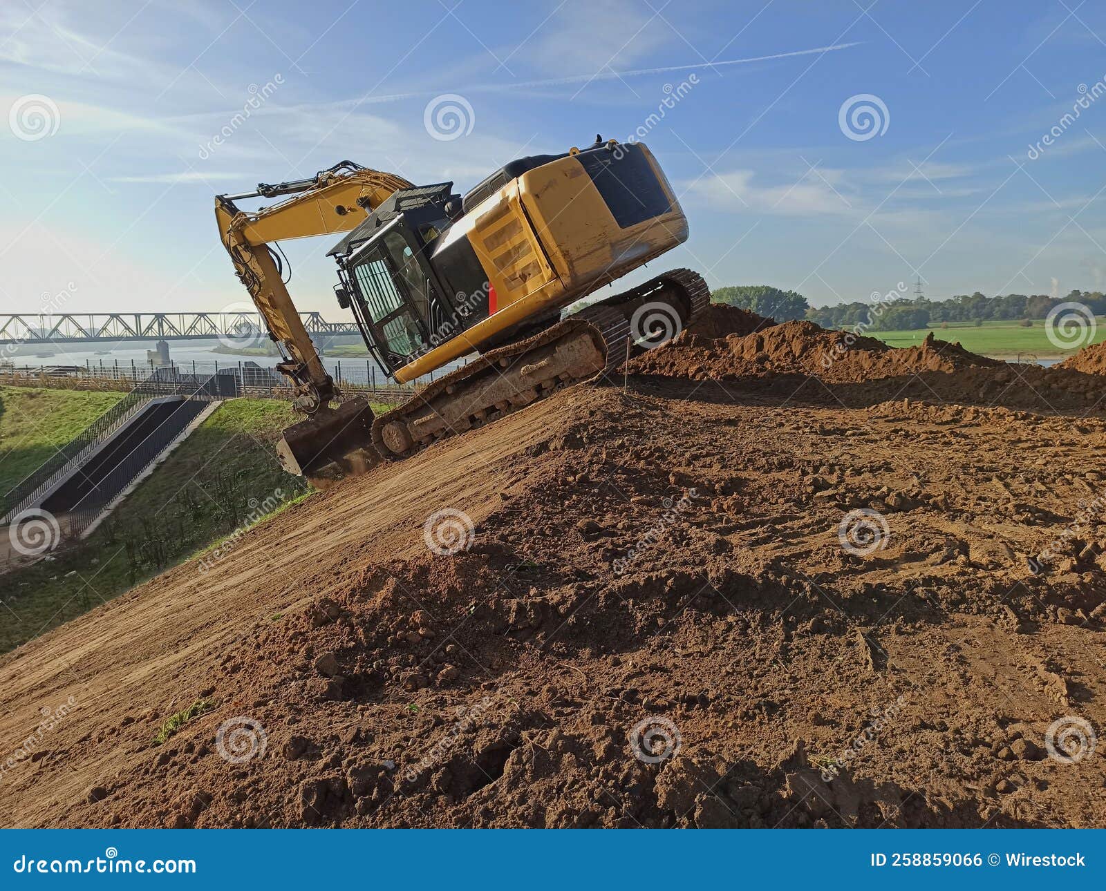 25-ton Excavator Preparing a Slope without Having the Full Support of ...