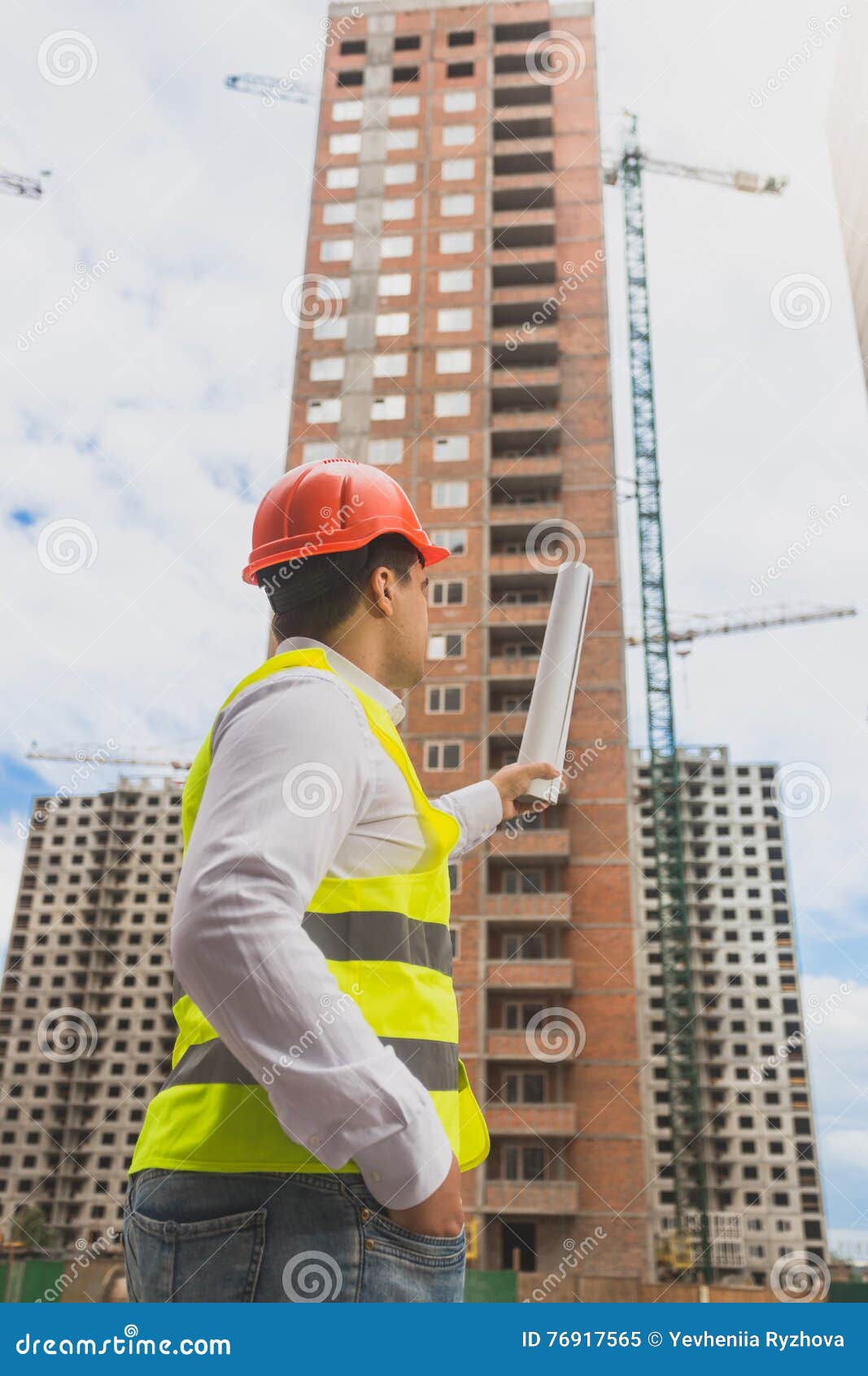 Toned Image of Architect Pointing at Building Under Construction Stock ...
