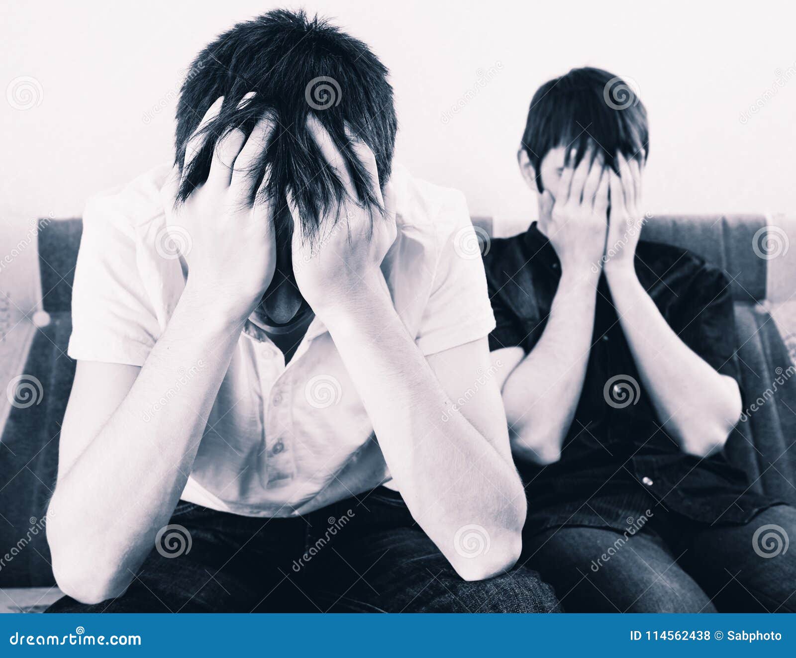 Two Sad Men stock photo. Image of friends, face, distress - 114562438
