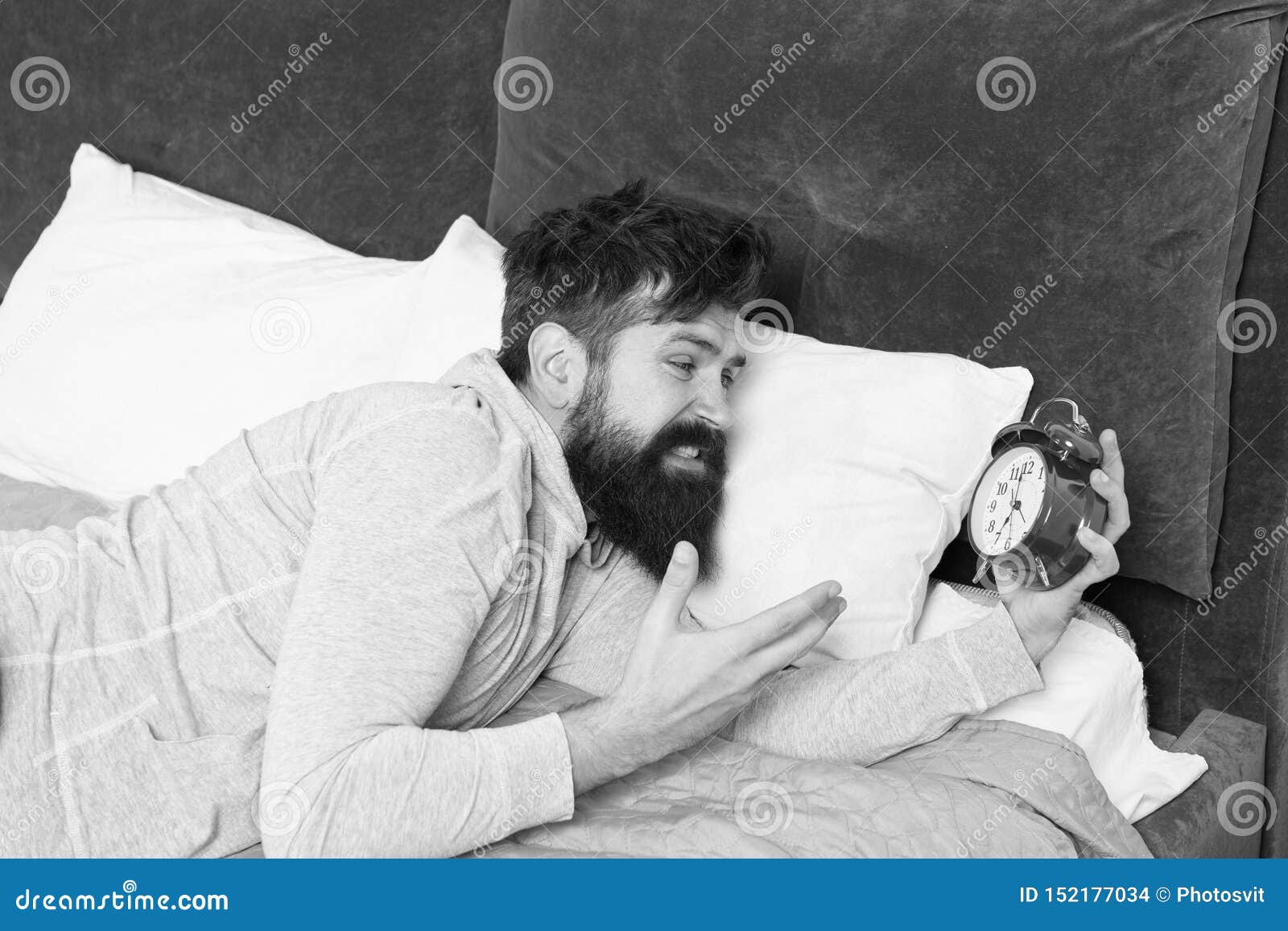 Too Early Bearded Man Hate Alarm Clock While Lying In Bed At Home Man