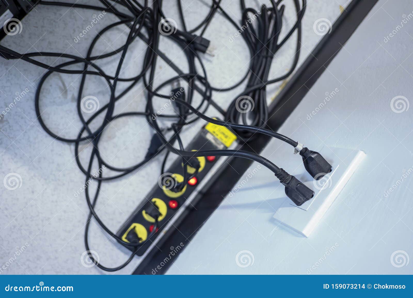 Too many plugs in a socket stock photo. Image of power - 159073214