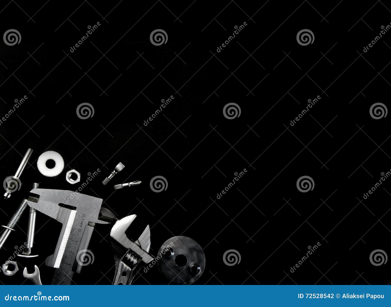Tool on a black background stock photo. Image of bolts - 72528542