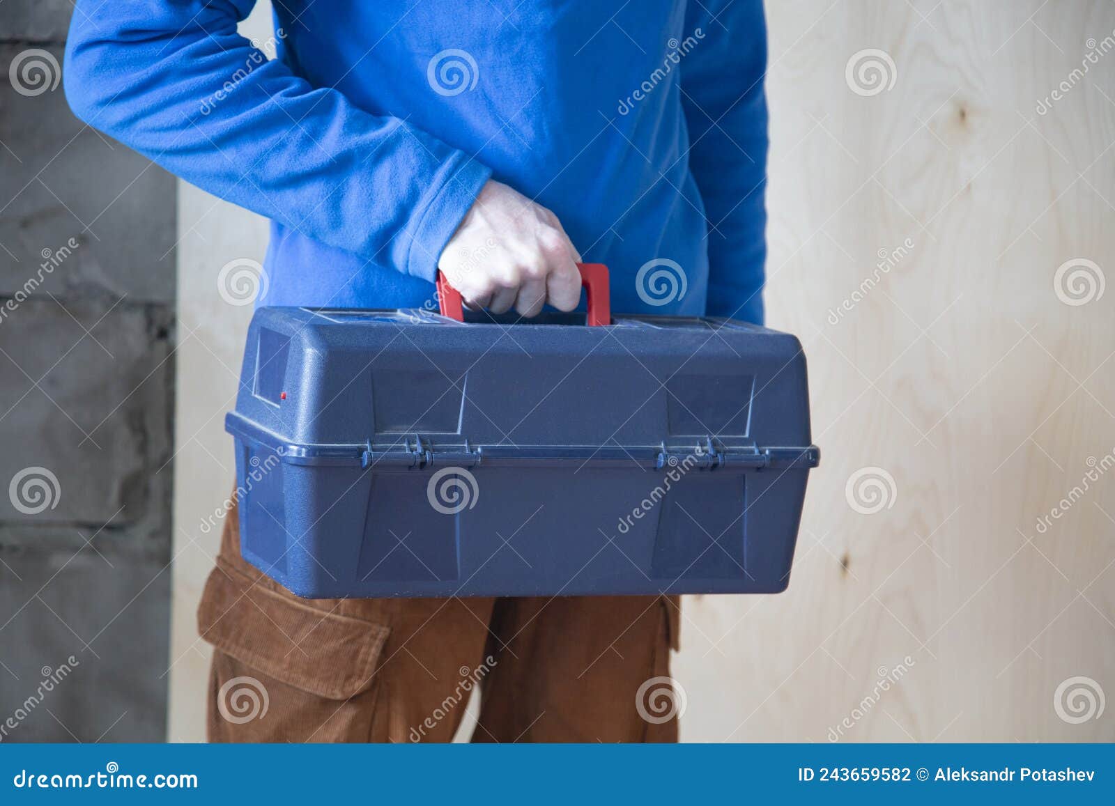 A Tool Box in the Hands of a Working Man. a Working Tool Stock Photo ...