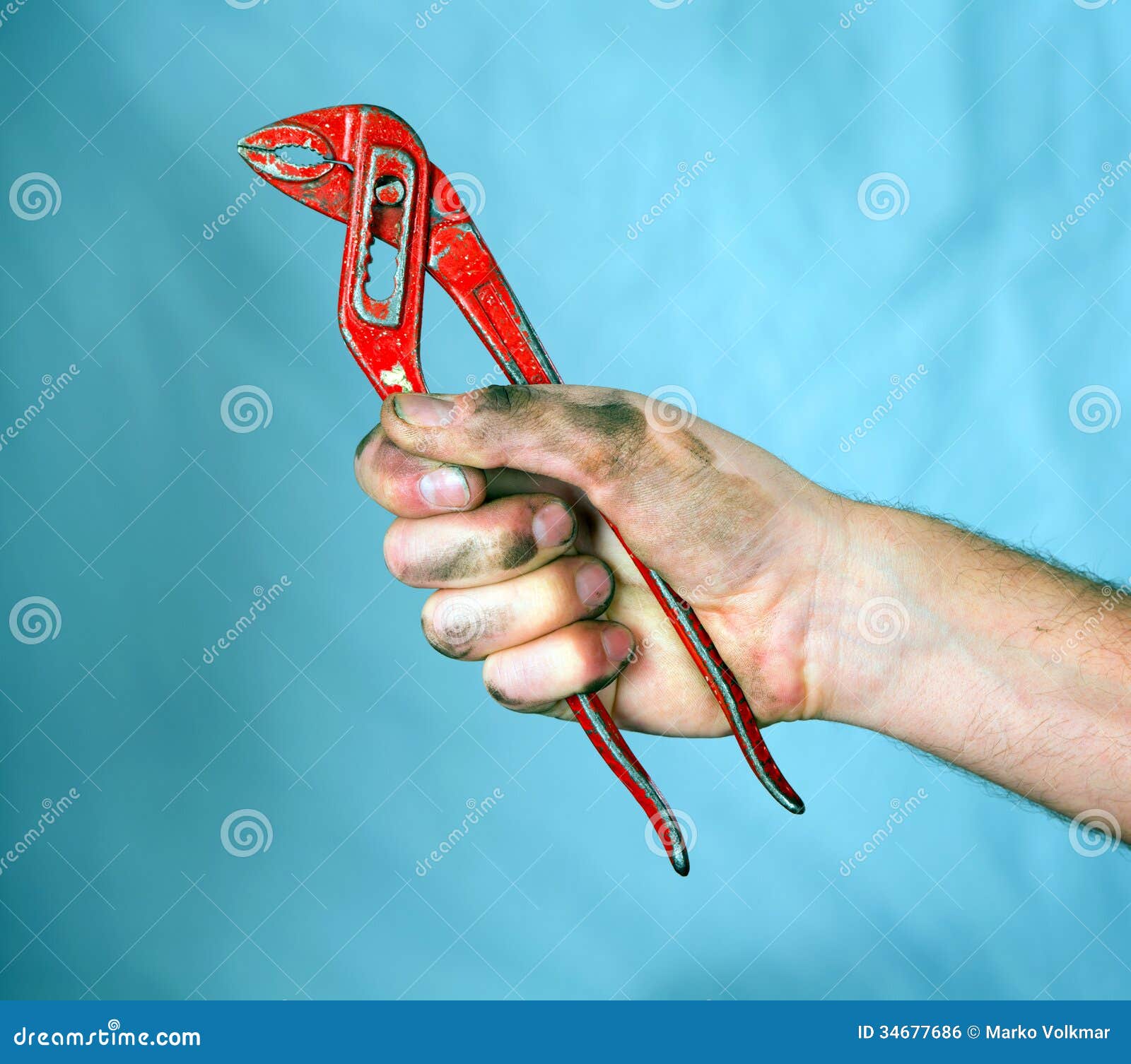 Tool in a hand stock photo. Image of gripper, pincer - 34677686