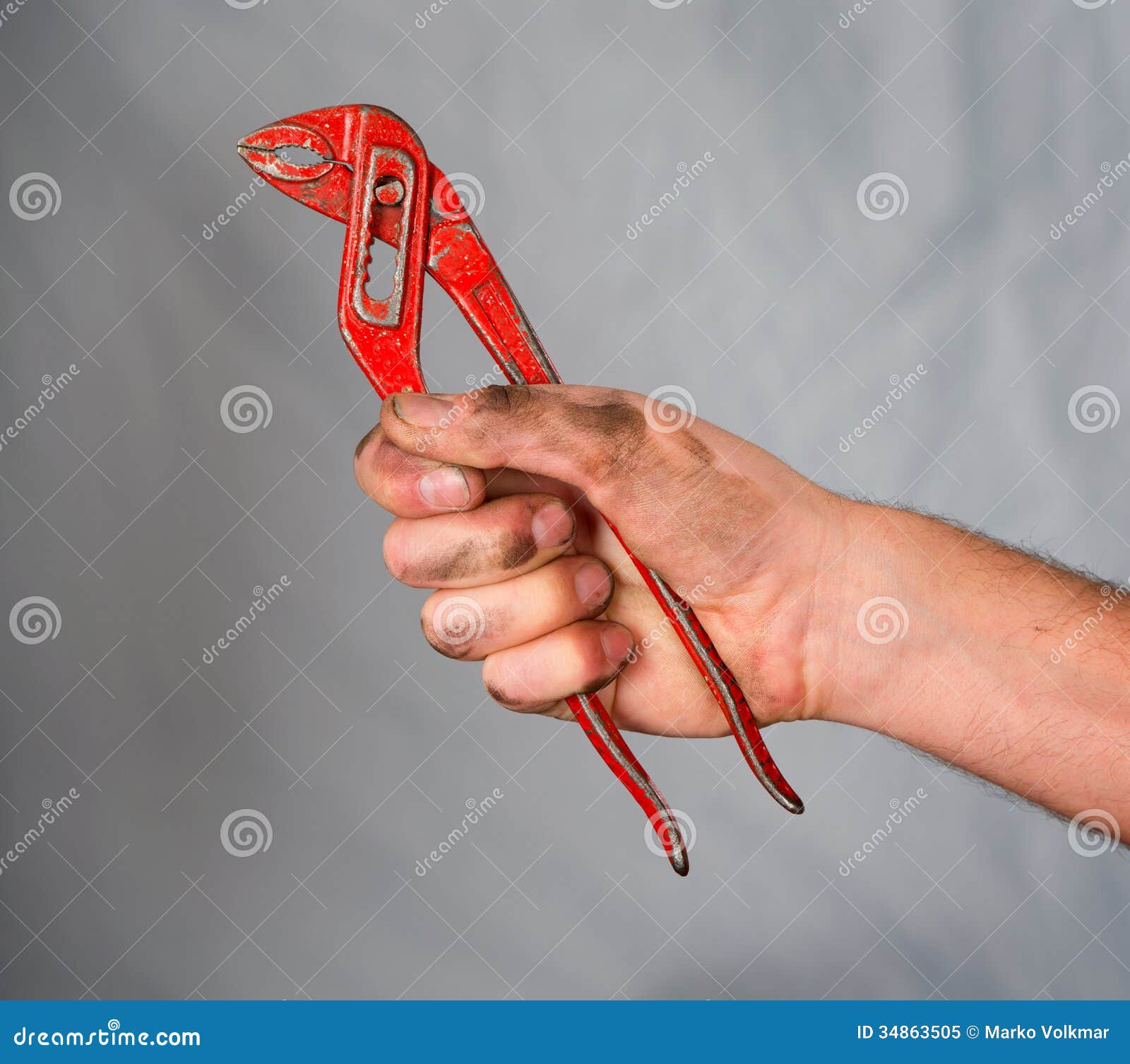 Tool in a hand stock image. Image of iron, hand, engineer - 34863505