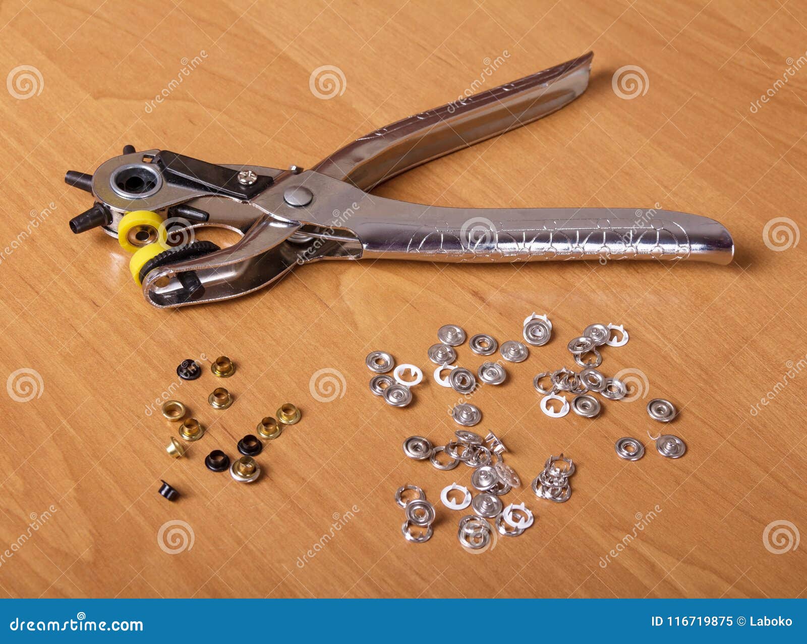 Tool for Making Holes and Installing Buttons on Clothes, on Table Stock ...