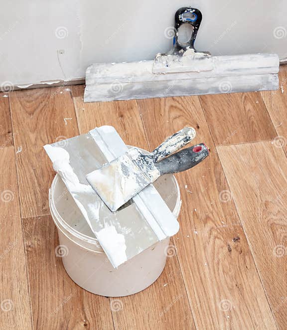 Tool for Plastering a Bucket with a Mixture. Stock Image - Image of ...
