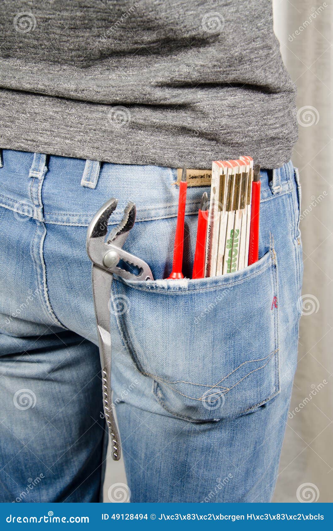 Tools in back pocket stock photo. Image of pipe, pliers - 49128494