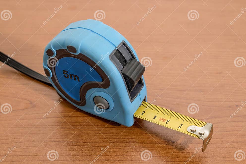 Tools, Blue Measuring Tabe on a Wood Table Stock Image - Image of mark ...