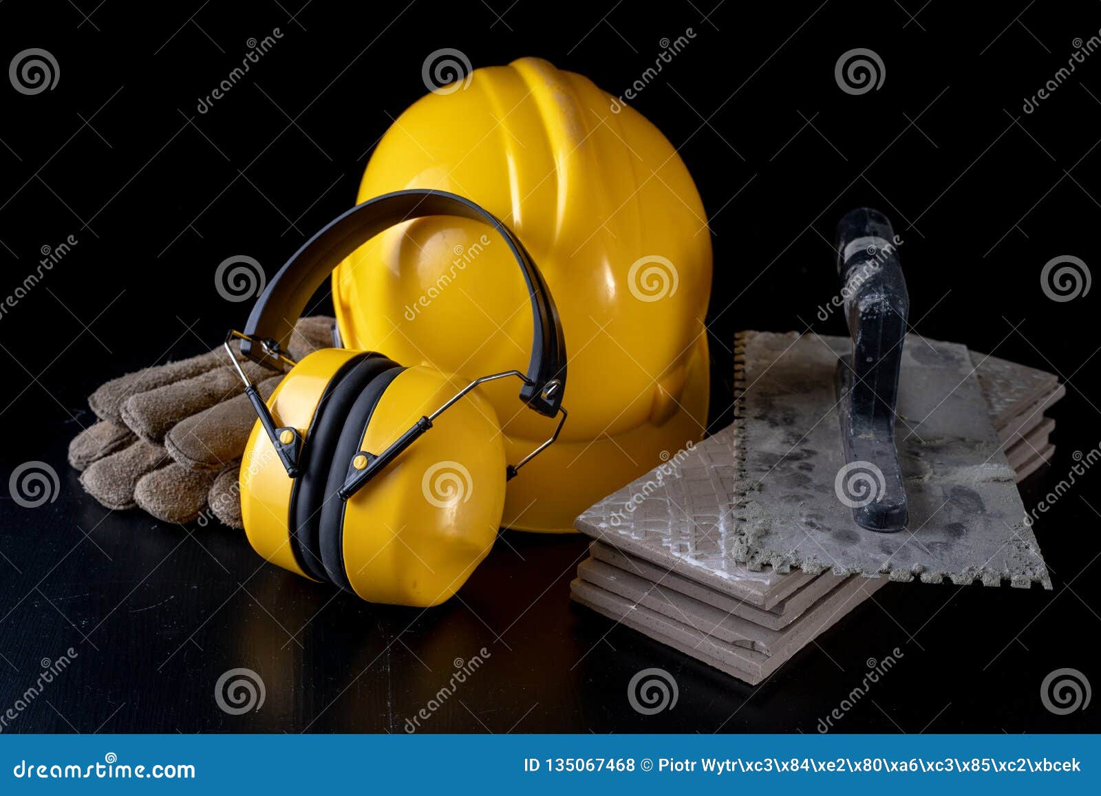 Tools for Bricklayer and Helmet on a Black Table. Accessories for ...