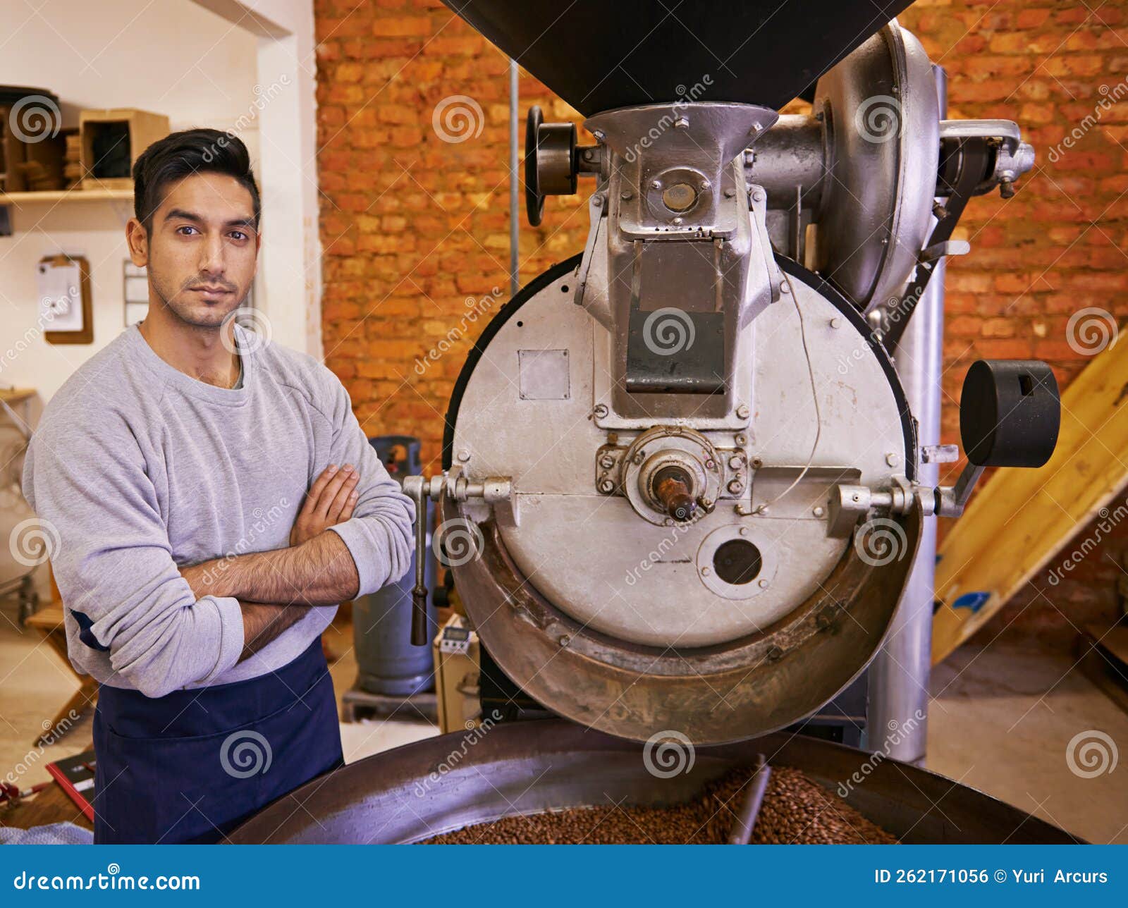 Tools of the Coffee Trade. a Machine Grinding and Roasting Coffee Beans ...