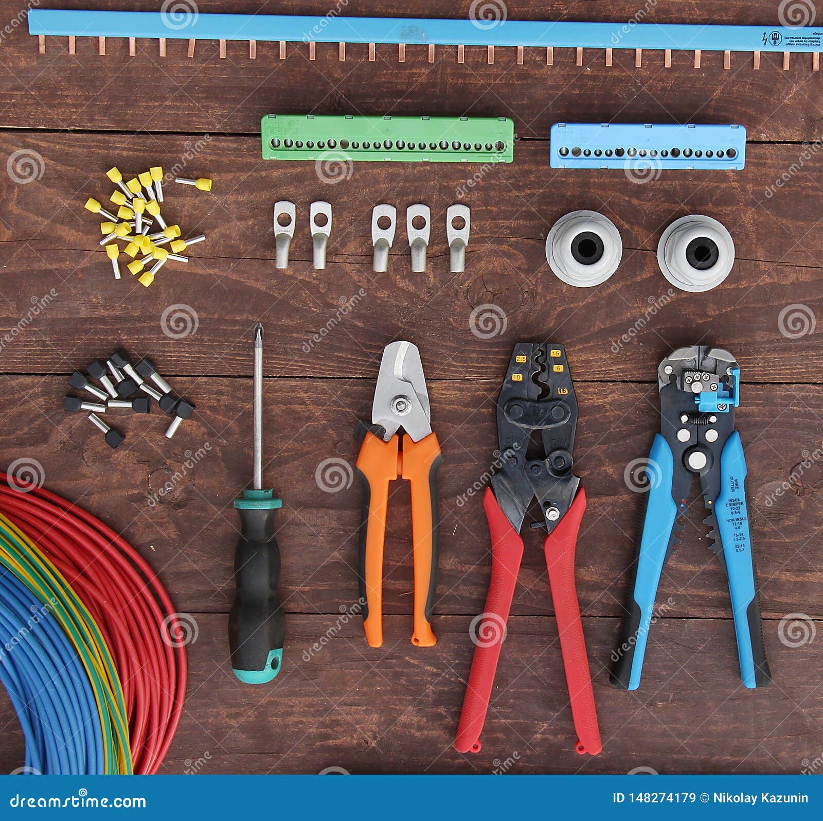 Tools for Electrical Work Laid Out on a Wooden Surface of Brown. Top ...