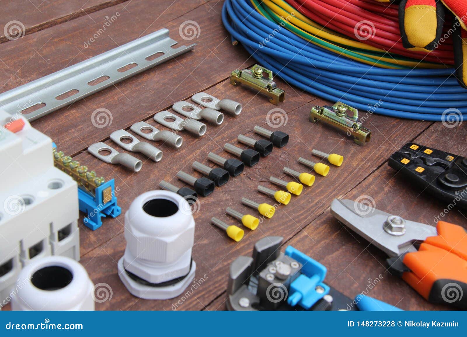 Tools for Electrical Work Laid Out on a Wooden Surface of Brown Stock ...