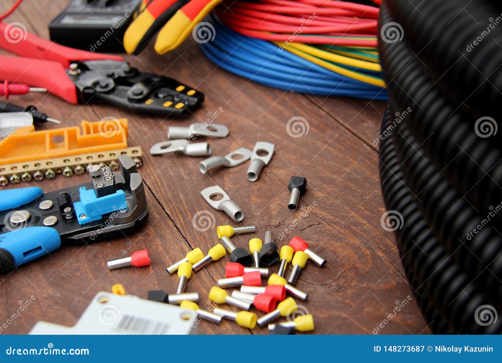 Tools for Electrical Work Laid Out on a Wooden Surface of Brown Stock ...