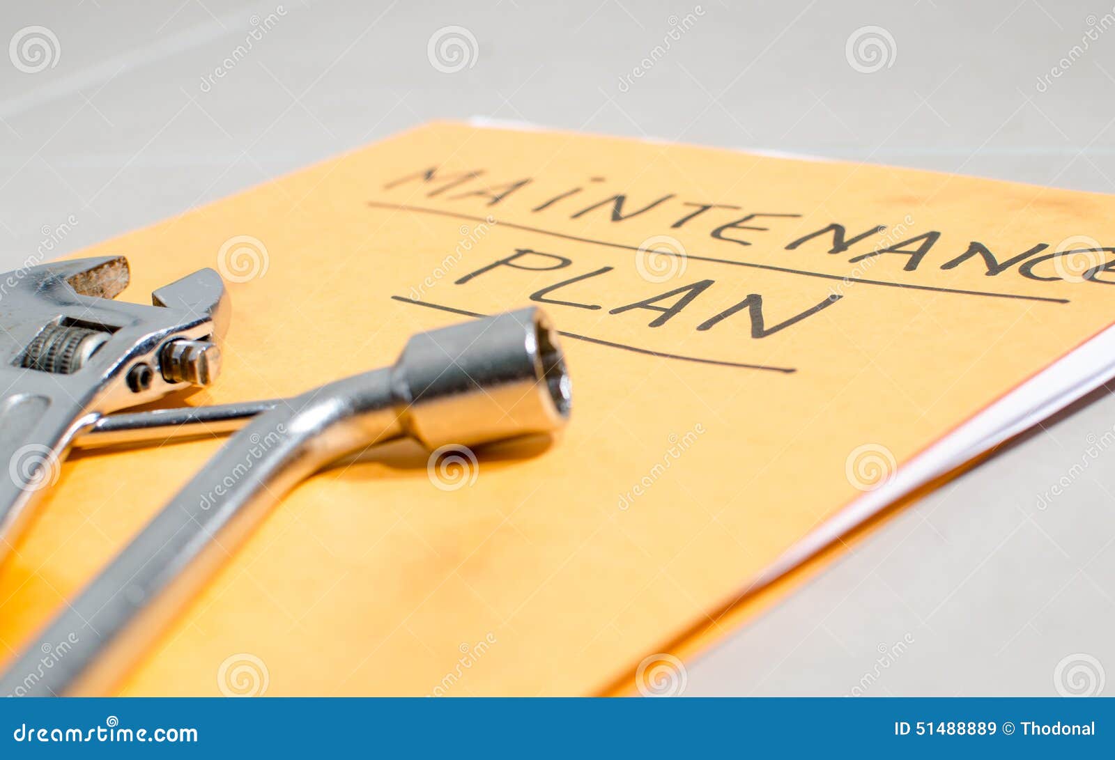 Tools on a Folder of Maintenance Plan Stock Image - Image of plan ...