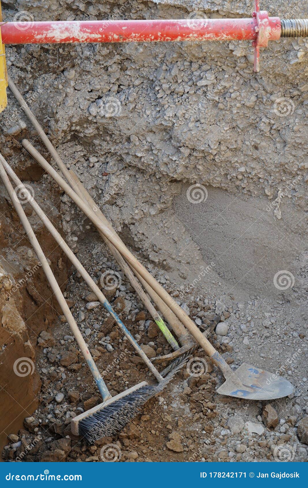 Tools Left in Building or Construction Pit, a Broom a Shovel and a ...