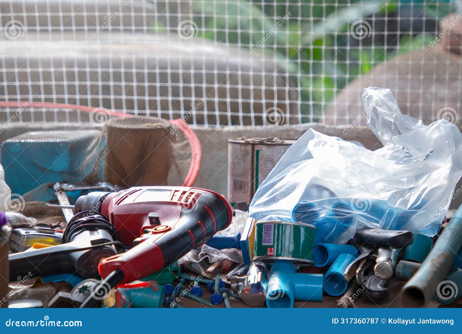 These Tools are Messily Managed on the Table. There is Electric ...