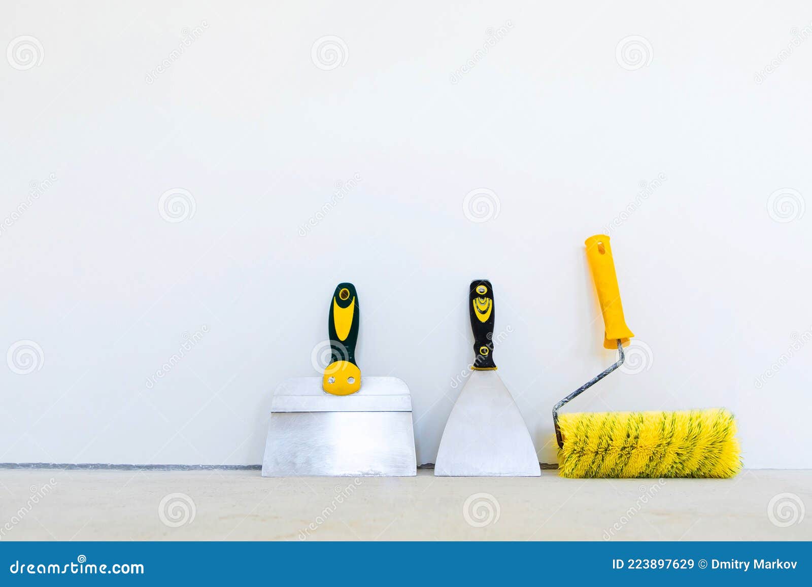 Tools Painter-plasterer. Putty And Paint The Walls. Plasterer Tools On ...