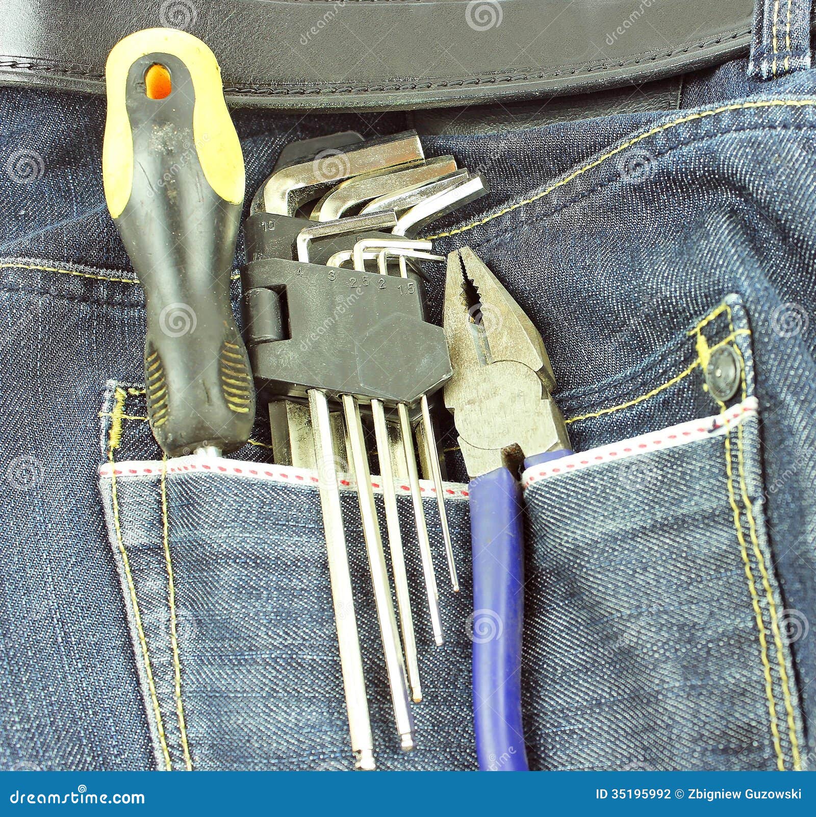 Tools on a pants pocket stock photo. Image of builder - 35195992