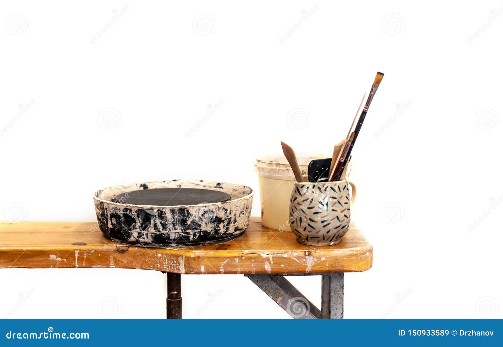 Tools for Pottery with Potters Wheel are Standing on the Wooden Table ...