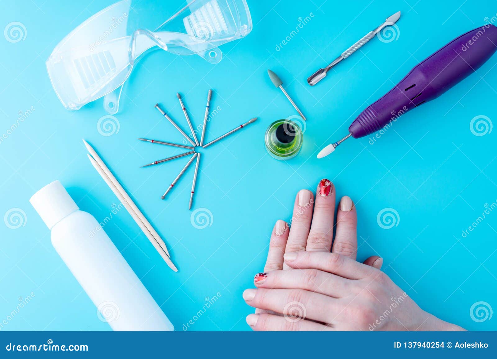 Tools for Professional Hardware Manicure and Women`s Hands on Blue ...