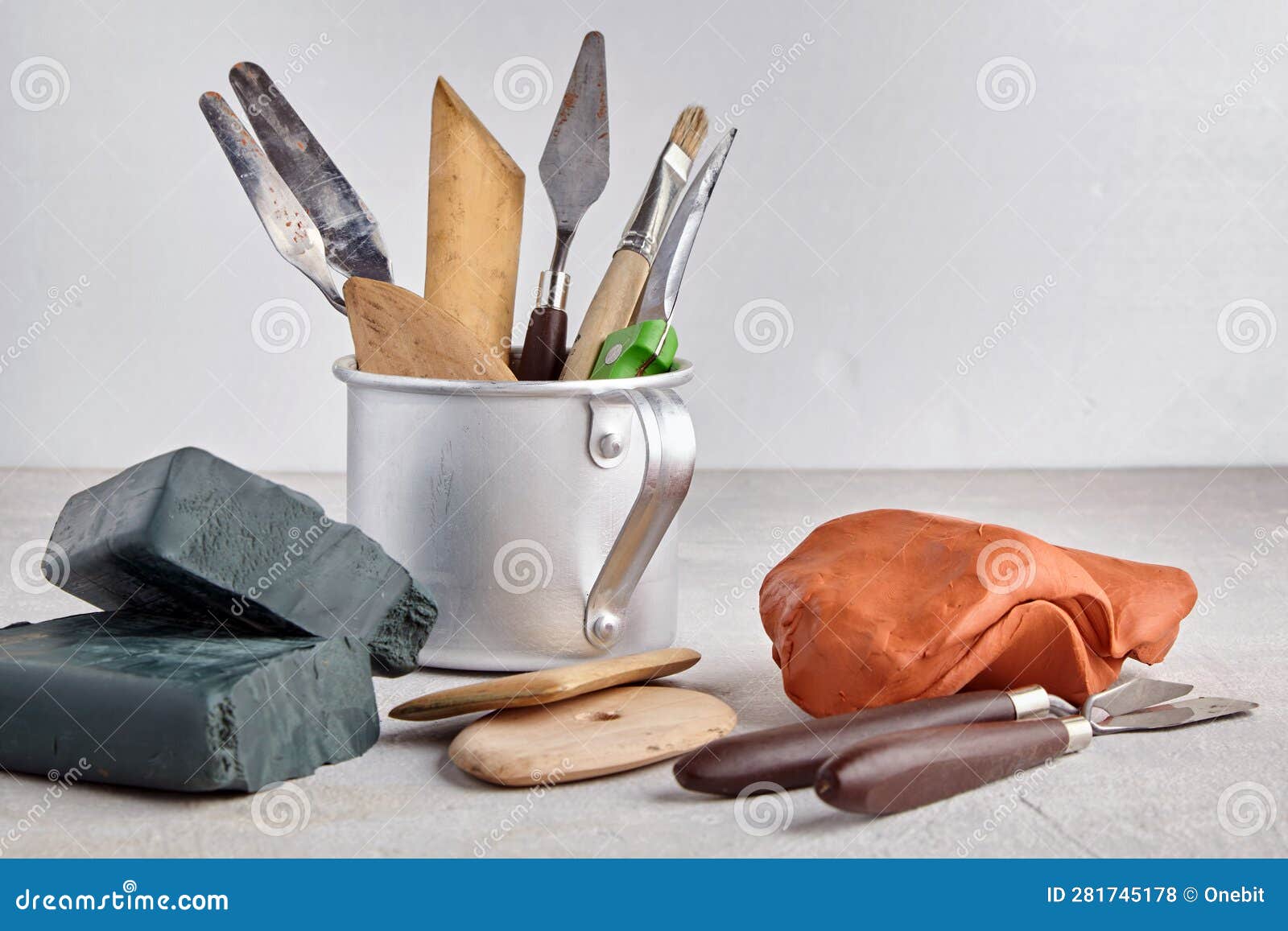 Tools for Sculpting and Modeling in an Aluminum Cup and Pieces of ...